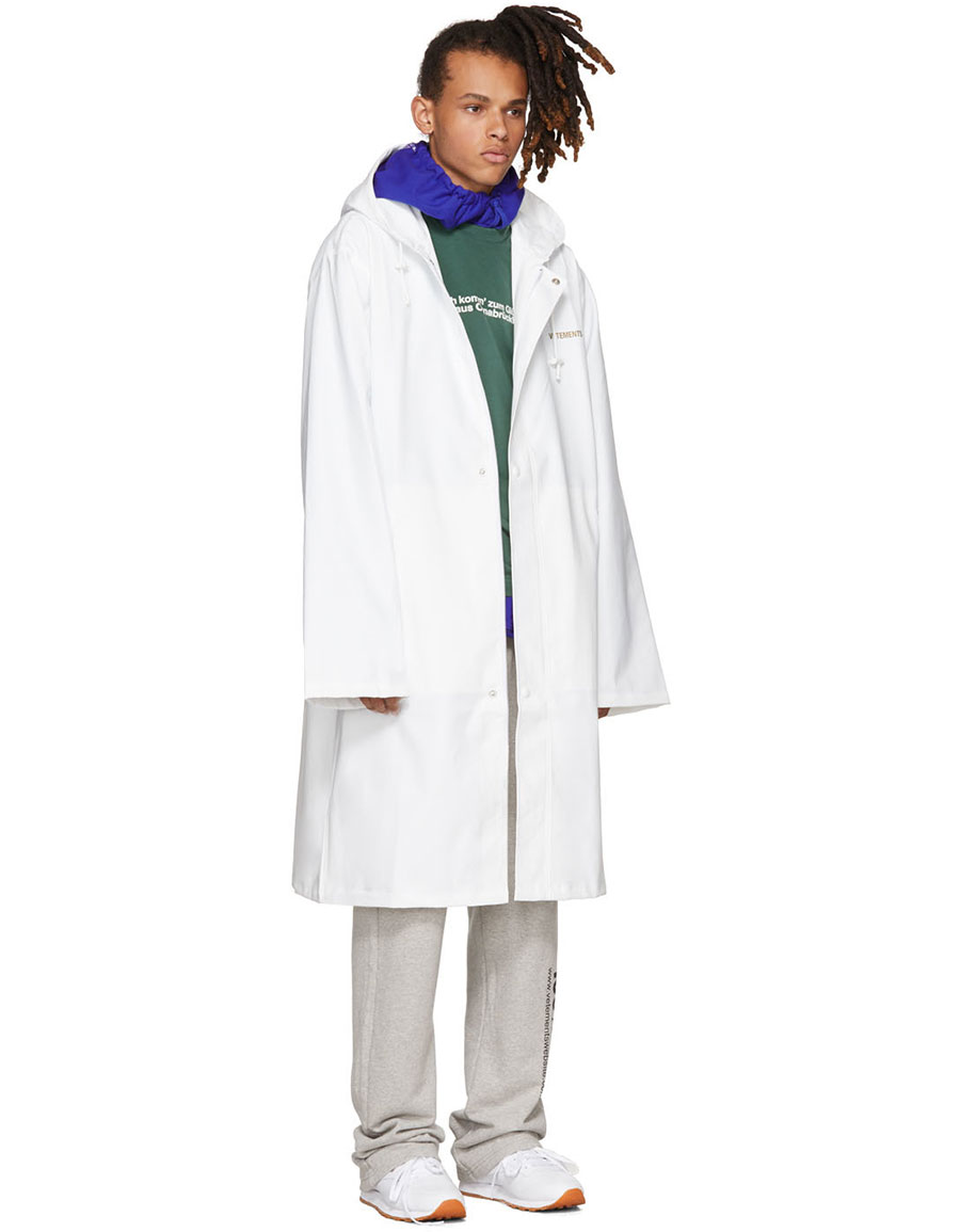 VETEMENTS White Logo Raincoat · VERGLE
